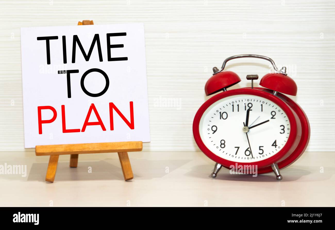 Time to plan concept. and alarm clock Stock Photo - Alamy