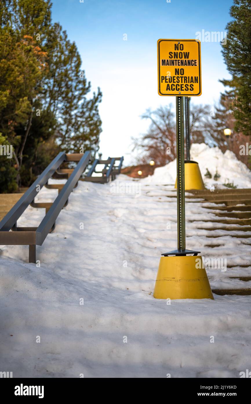 No Snow Maintenance Pedestrian Warning Sign Stock Photo - Alamy