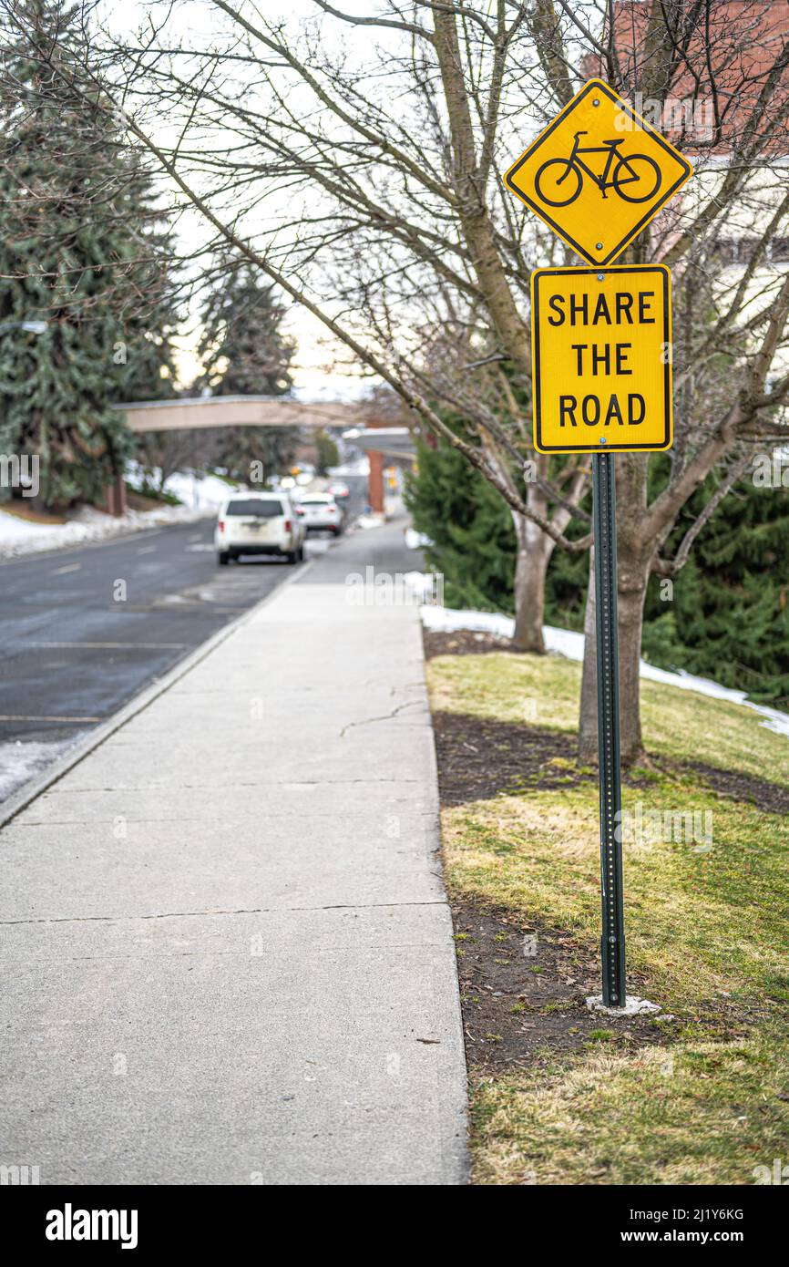 Share the Road with Bicycles Sign Stock Photo - Alamy