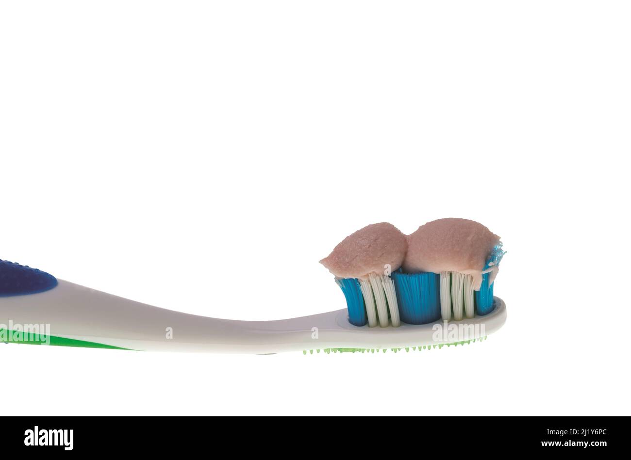 Close up view of toothbrush with toothpaste isolated on white ...