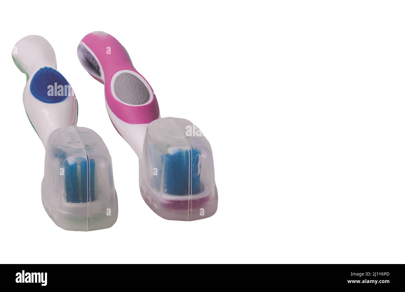 Close up macro view of two toothbrushes isolated on white background ...