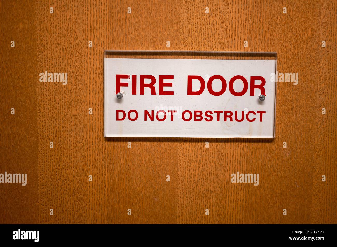 Fire Door Do Not Obstruct Sign Stock Photo - Alamy