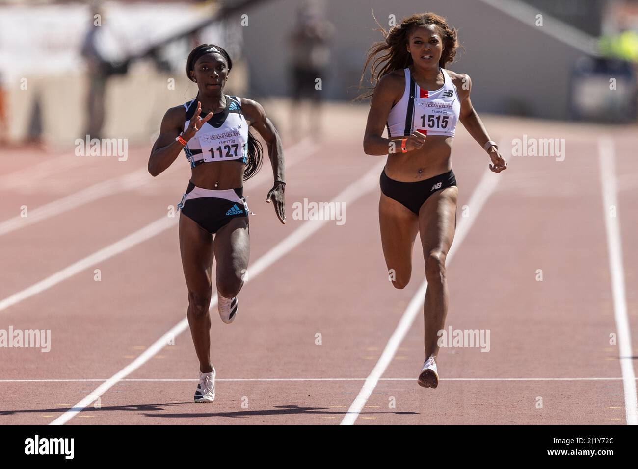 Tamara Clark of Adidas and Gabrielle Thomas of New Balance sprint to ...