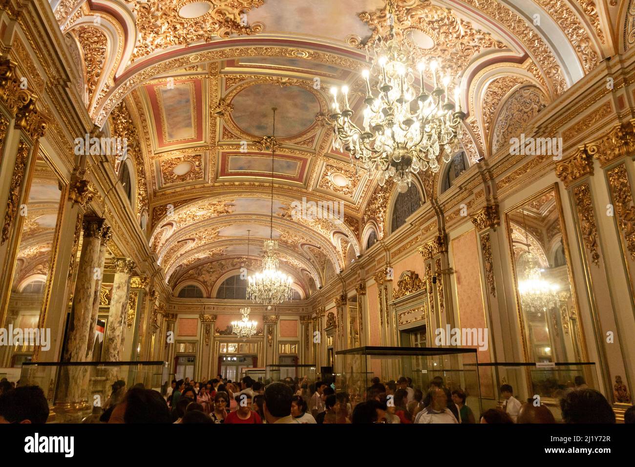 A the yellow walls and marble columns inside the Municipal palace of ...