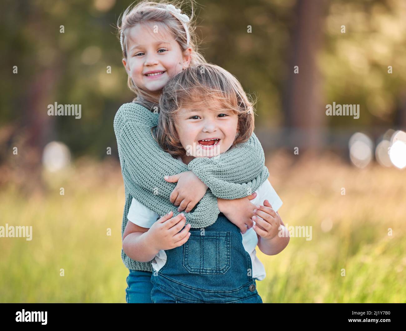I love my little brother so much. Shot of an adorable little girl and ...