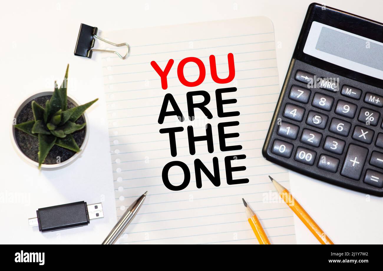 You are the one word written under torn paper Stock Photo - Alamy