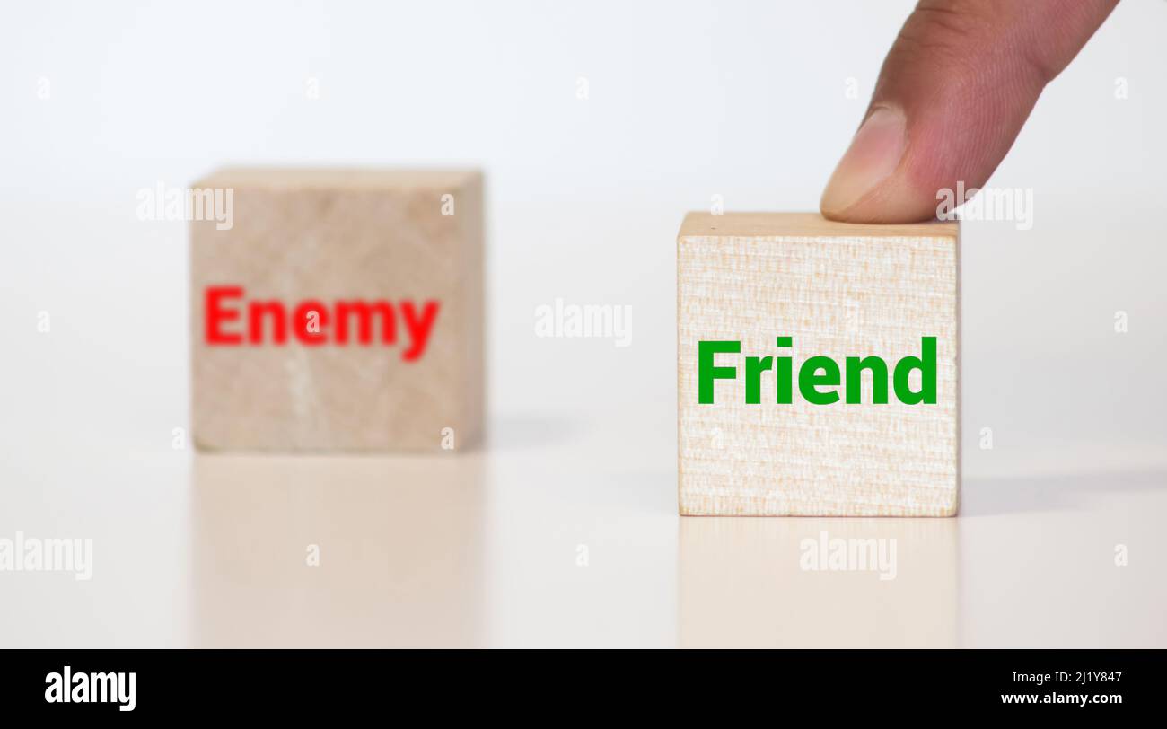 ENEMY word written on wood block, concept Stock Photo - Alamy
