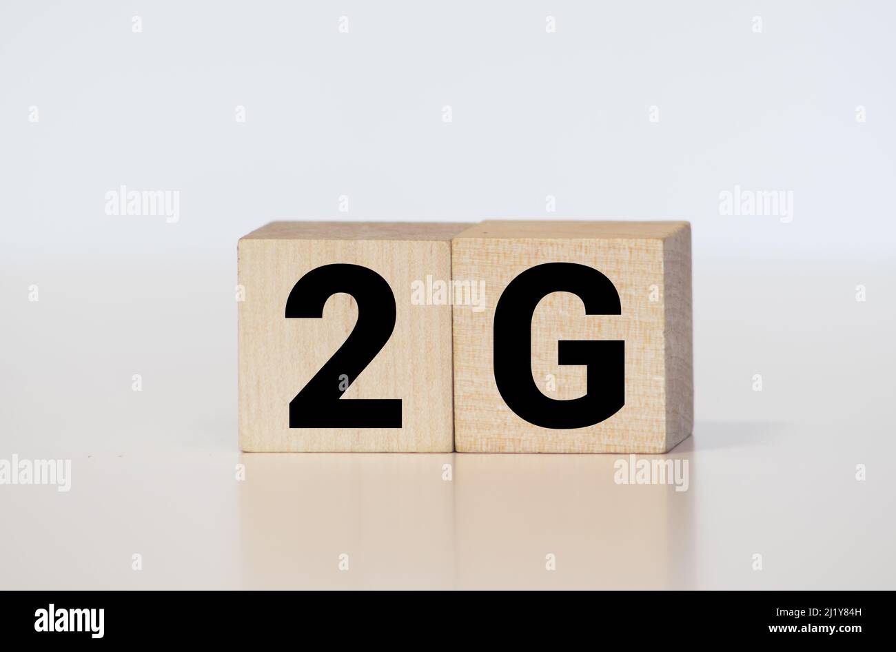 the word of 2G on wooden cubes Stock Photo - Alamy