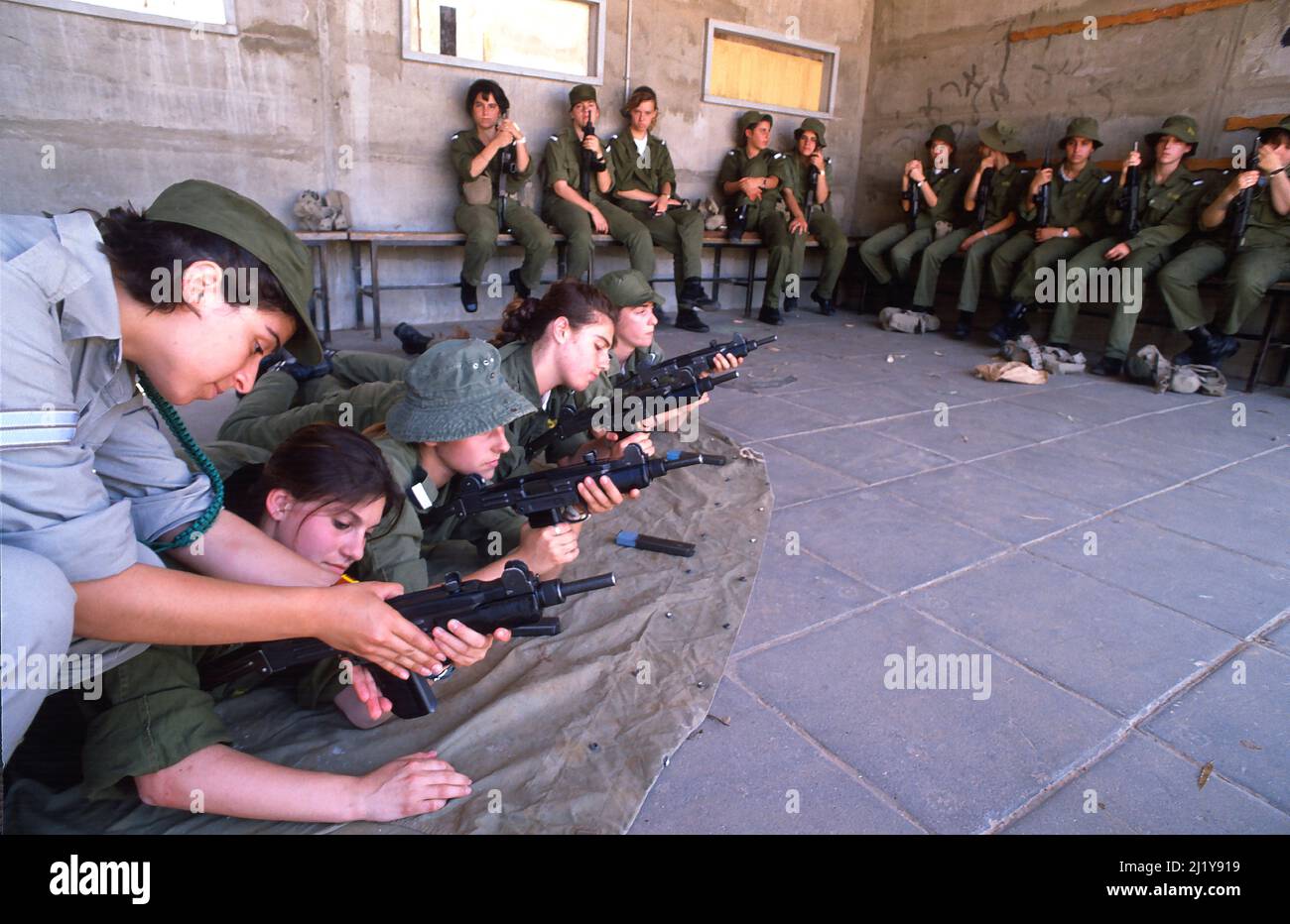Woman IDF soldiers train with Uzi submachine guns in Israel Stock Photo ...