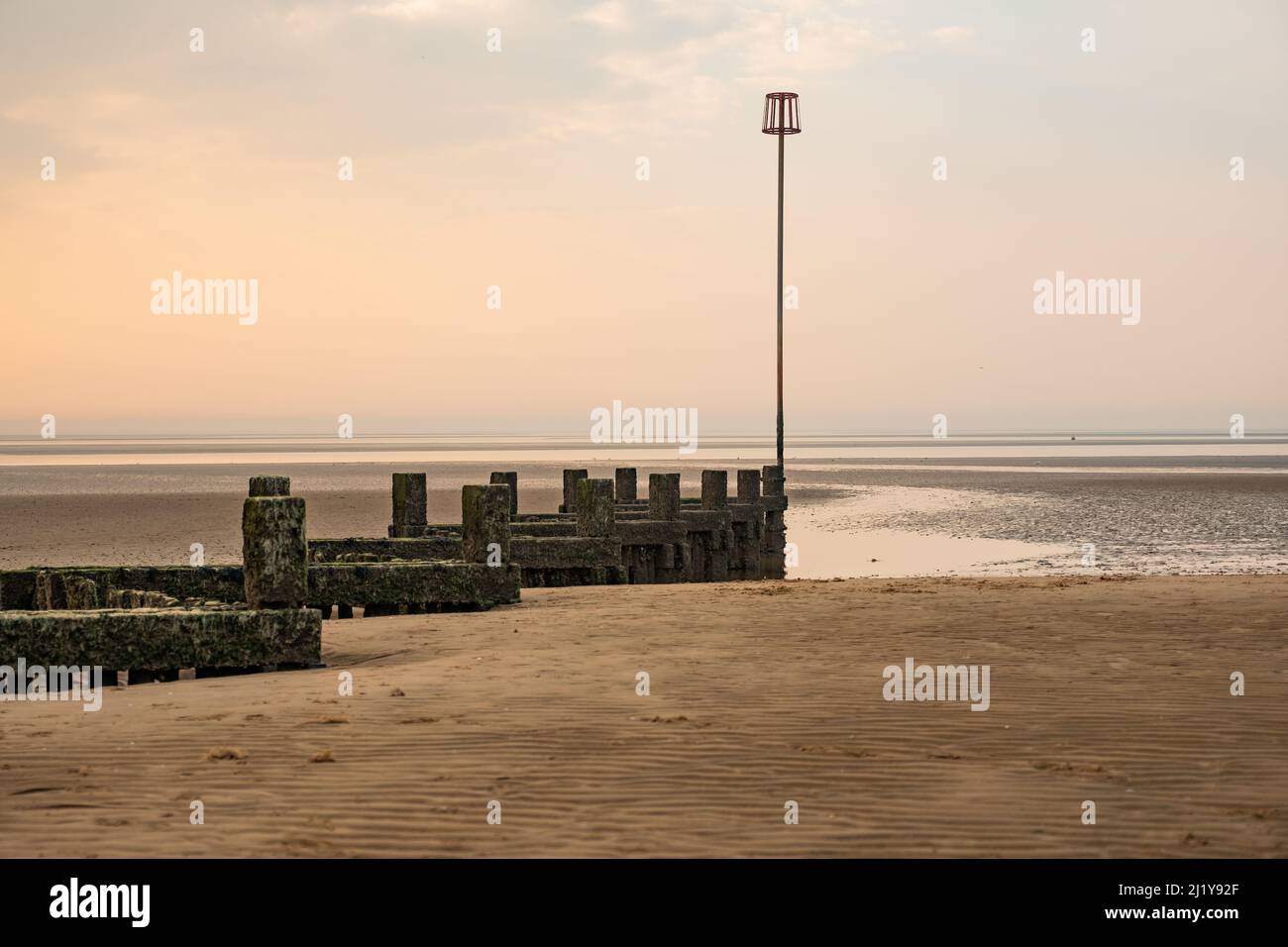 Wooden seaside breaker or groyne on Hunstanton beach on the North ...