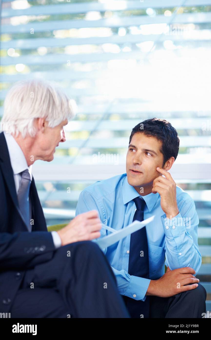 Contract issues. Portrait of good looking business men in discussion ...