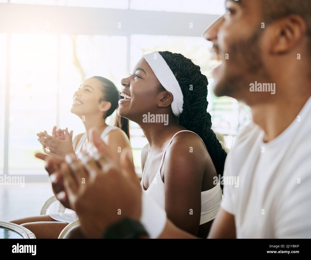 Its awards time. Cropped shot of three young tennis players clapping ...