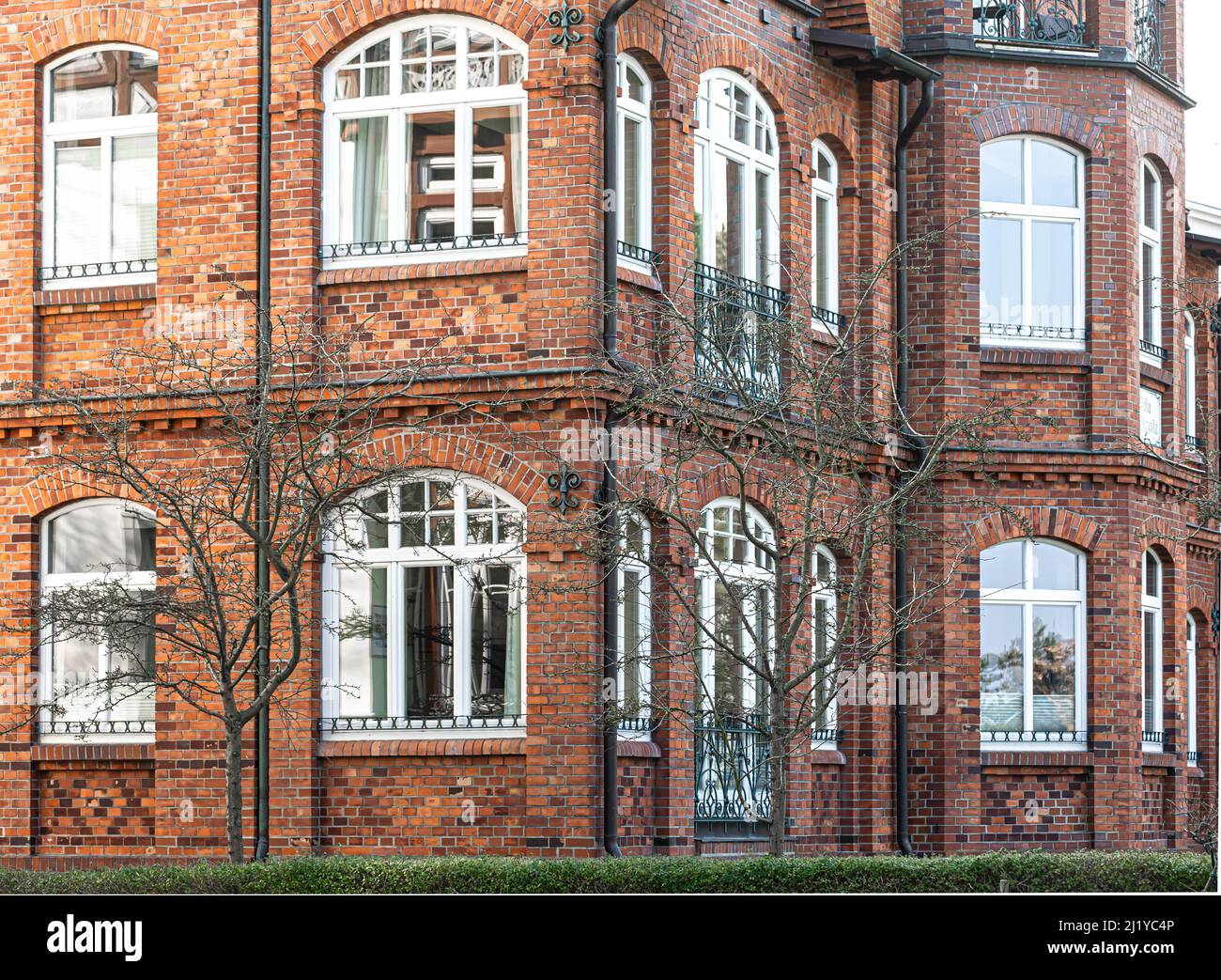 Beautiful old brick house with plastic windows Stock Photo - Alamy