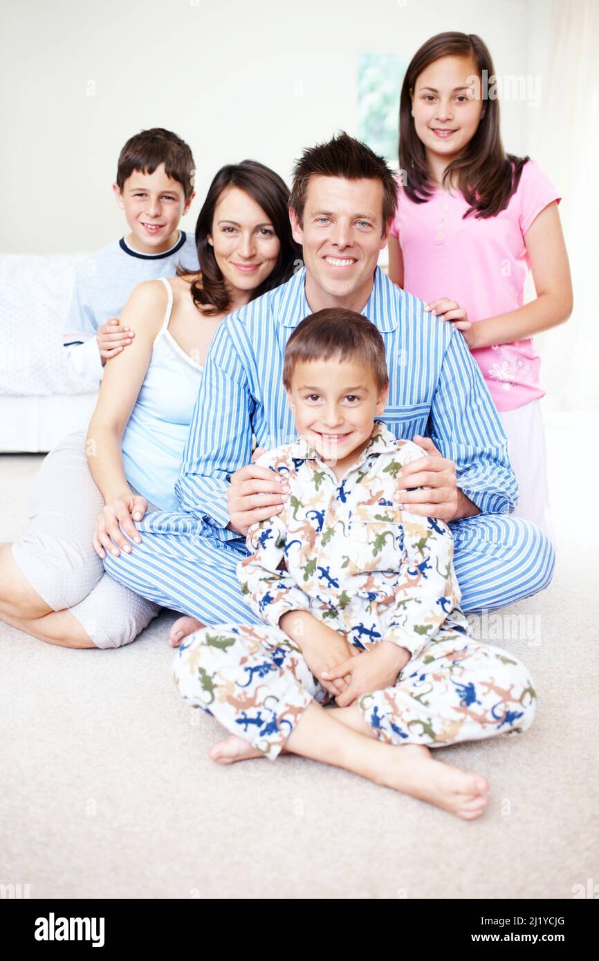 Early risers on a saturday morning. Portrait of a cute little boy with ...