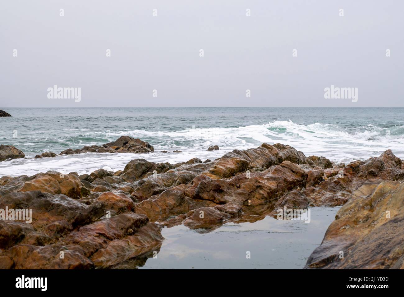 Ocean landscape, waves breaking onshore. Rocky shores Stock Photo - Alamy