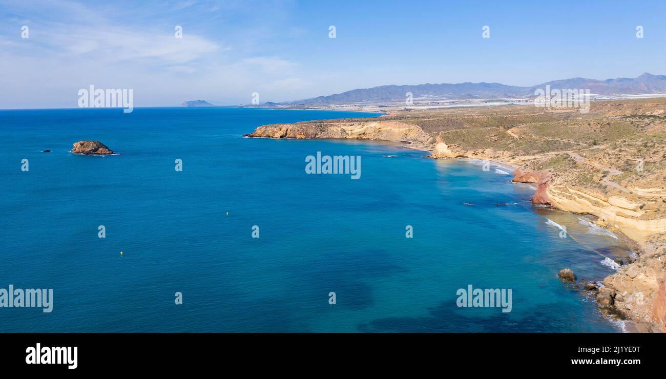 Drone panorama of Bolnuevo’s coastal cliffs and deep blue Mediterranean ...