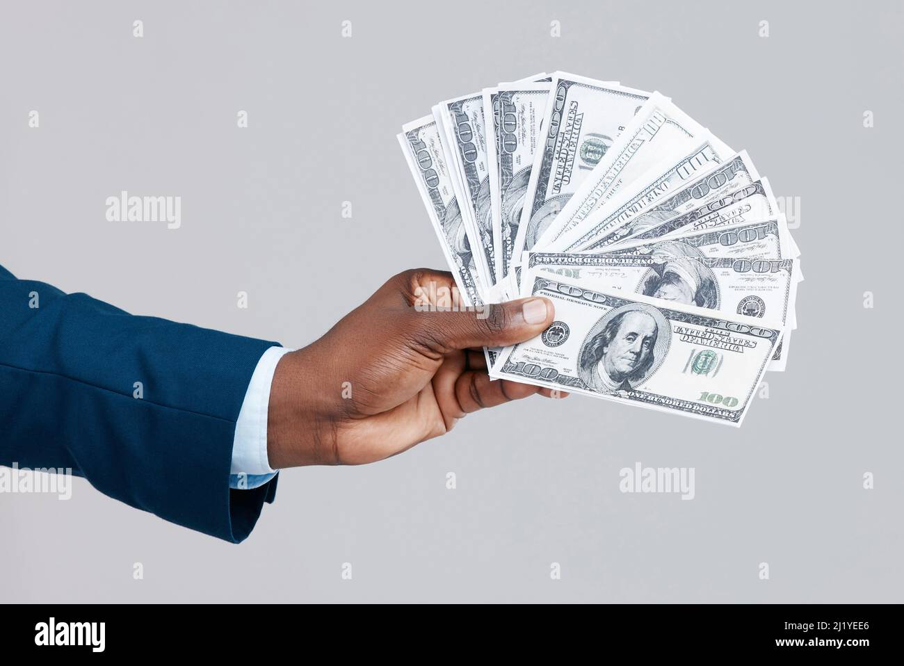 Who wants to go shopping. Studio shot of an unrecognisable businessman ...