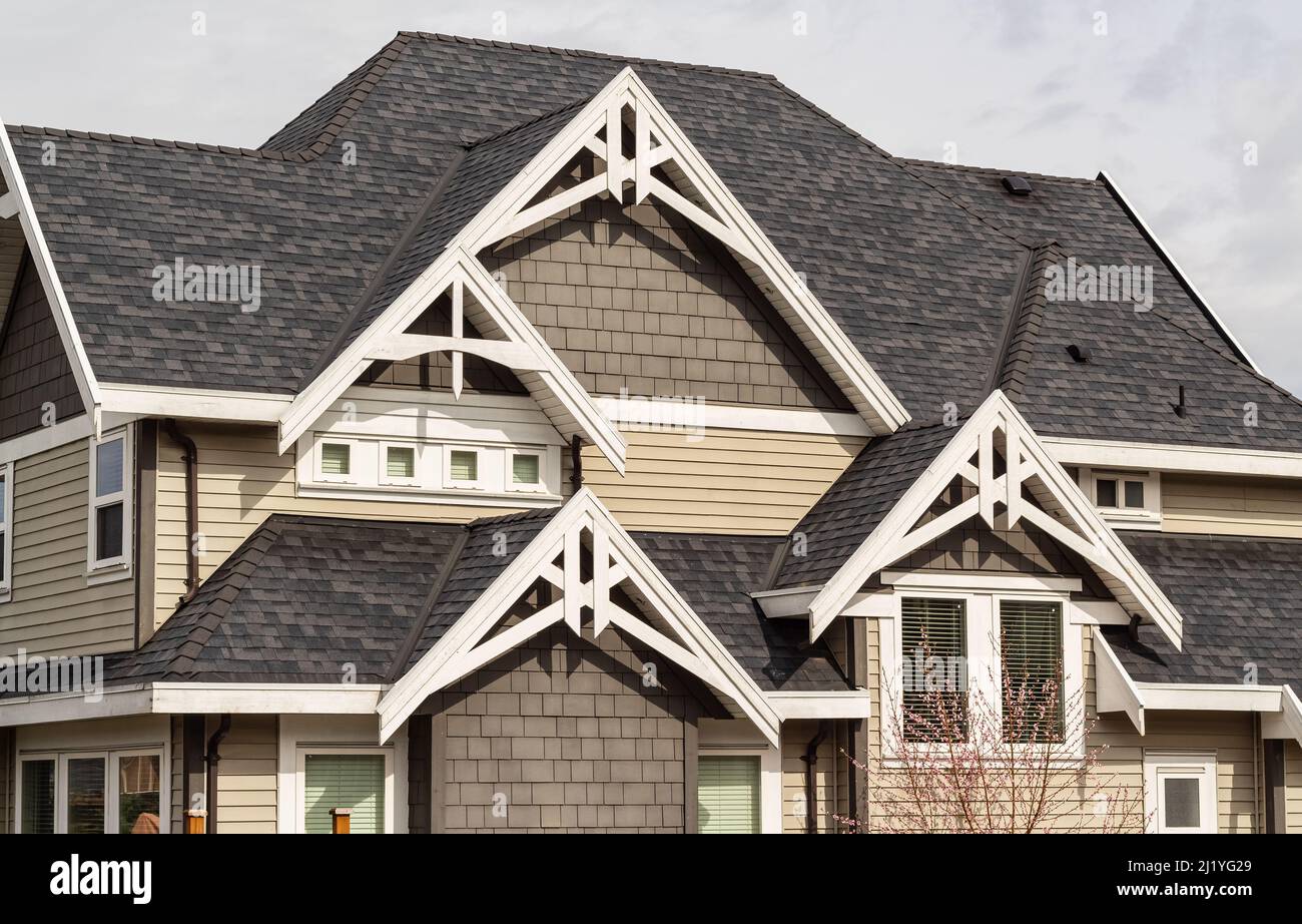 The roof of the house with details of exterior. Street view, nobody ...