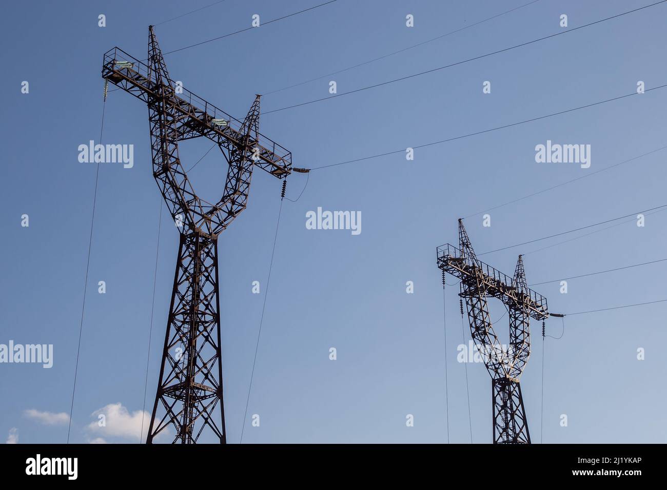Electricity and lighting. High-voltage power line towers Stock Photo ...