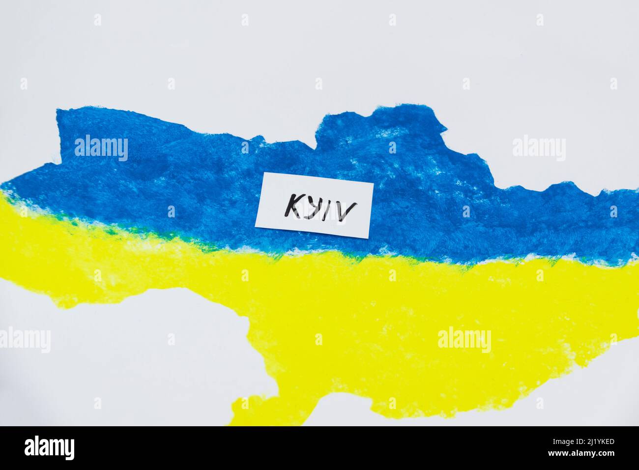 The Ukrainian map in blue and yellow colors with banner on it with word ...