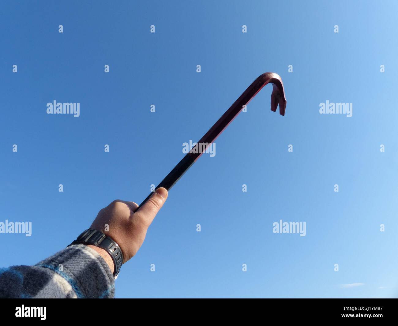 Burglar hand holding crowbar hi-res stock photography and images - Alamy