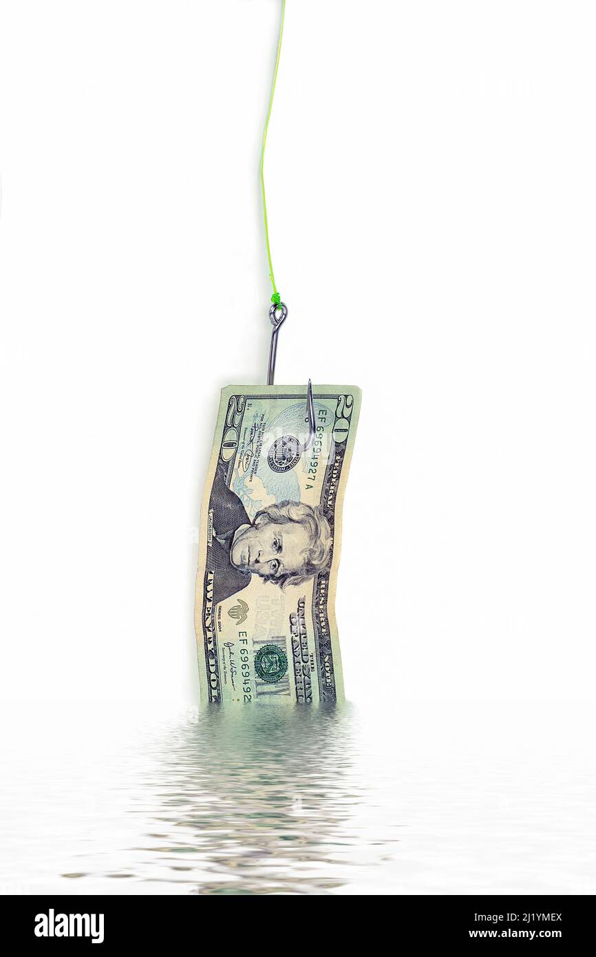 Twenty dollar bill dangling from a fish hook with water reflection on ...