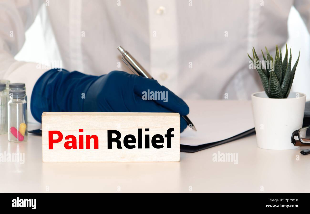 Pain Relief. Medical Doctor showing information. concept Stock Photo ...