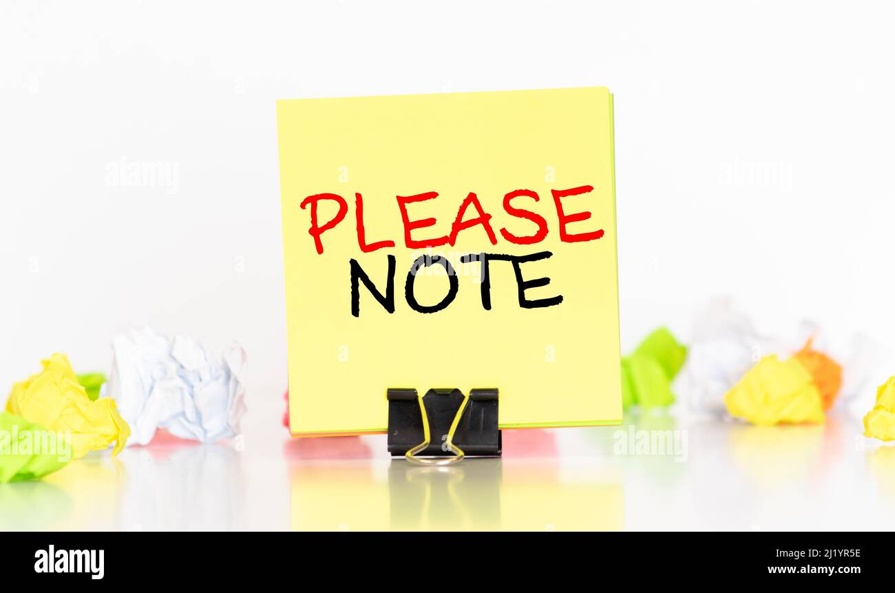 Wording 'please, take note' on a note book Stock Photo - Alamy
