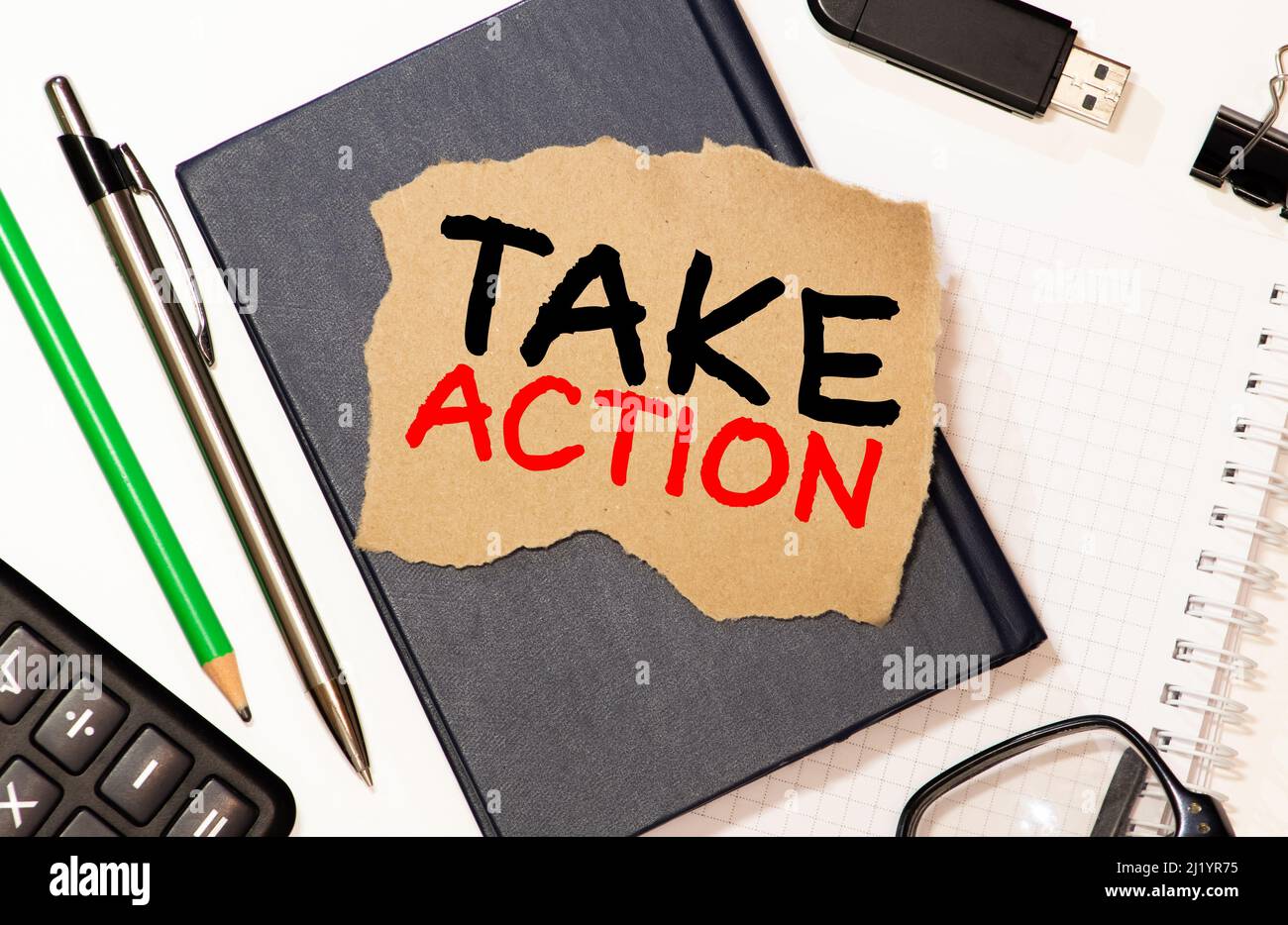 Take action words on chalkboard background. Topn paper Stock Photo - Alamy