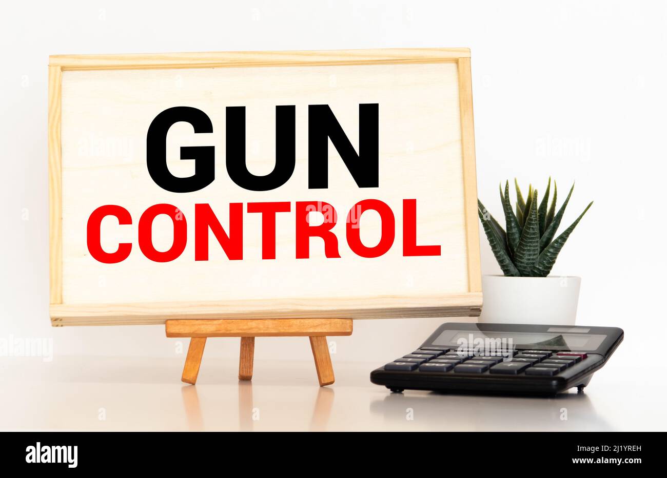 Text in English spelling hashtag gun control against United States of ...