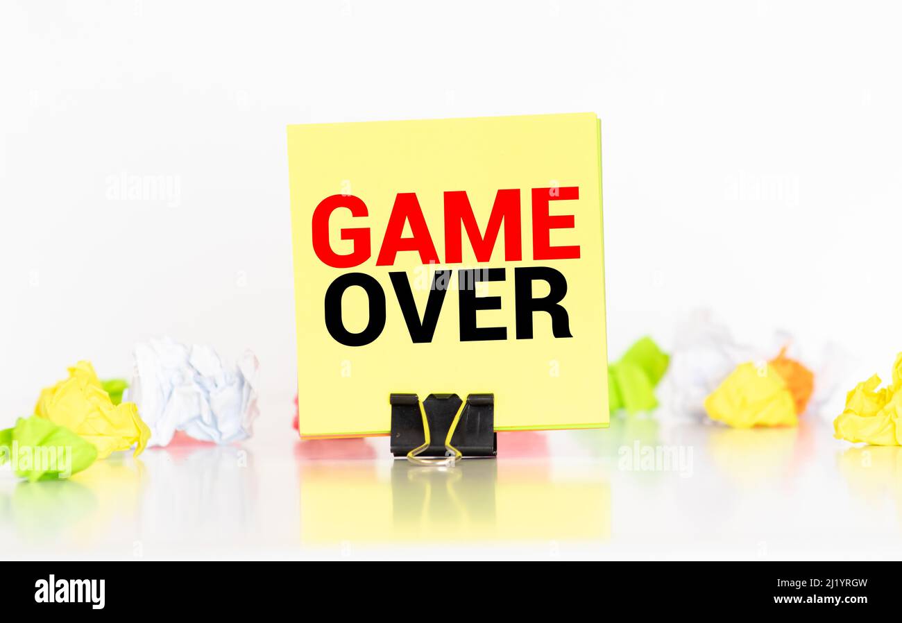 Lightbox with word game over on wood background Stock Photo - Alamy