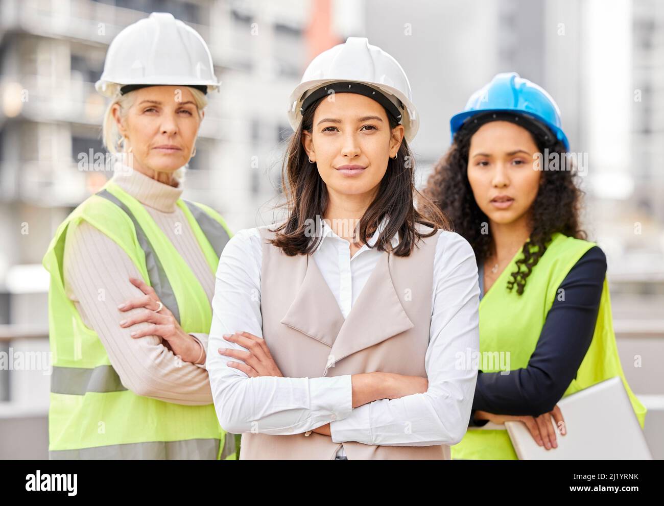 Construction confidence. Cropped portrait of three attractive female engineers standing with ...