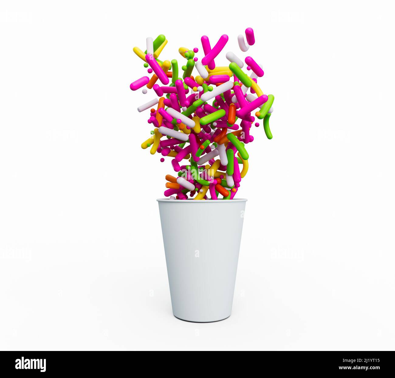A shot of Sprinkles spilling out of a cup Container isolated on white ...