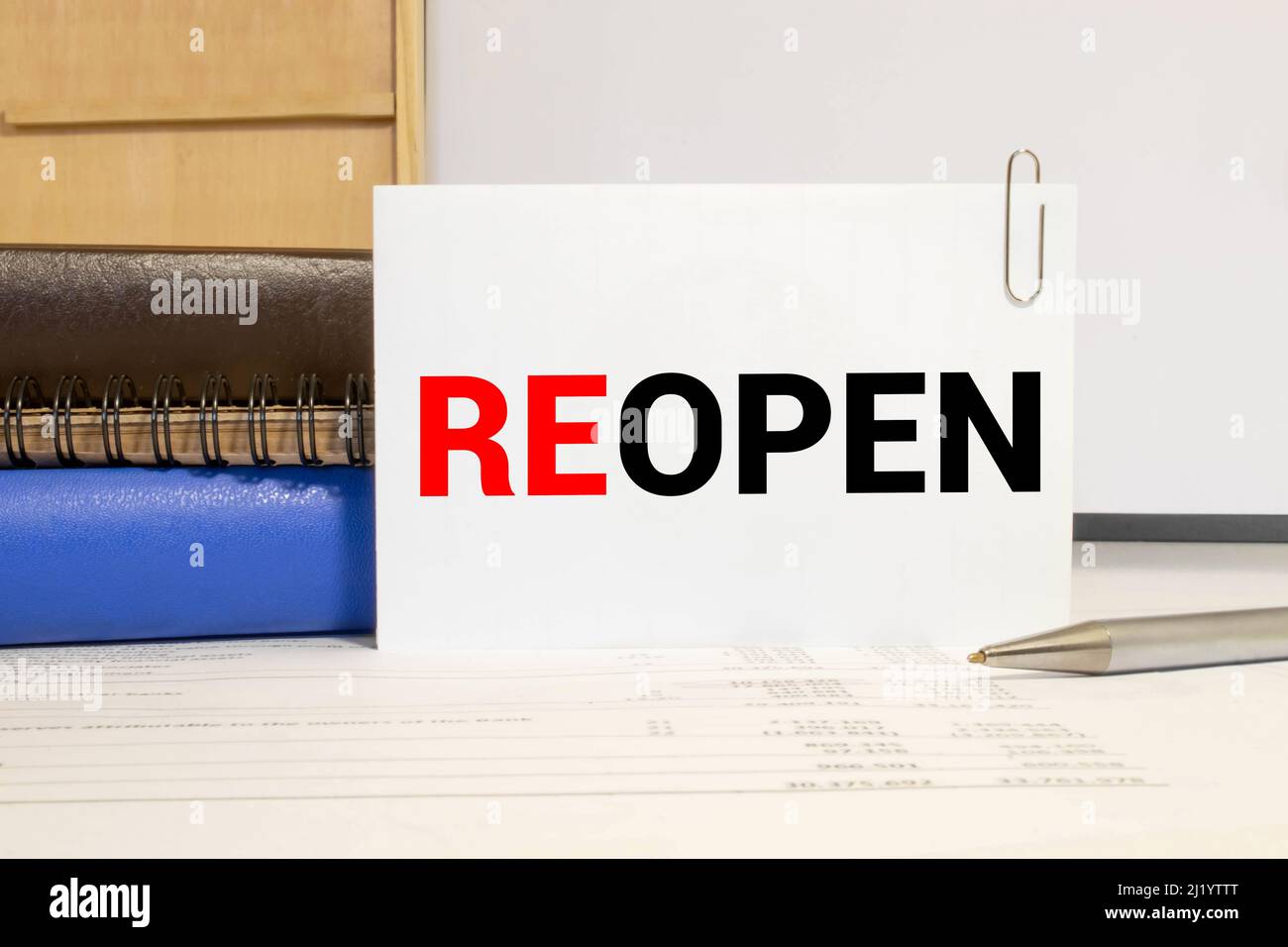 Reopening concept after the coronavirus pandemic. REOPEN word on a ...