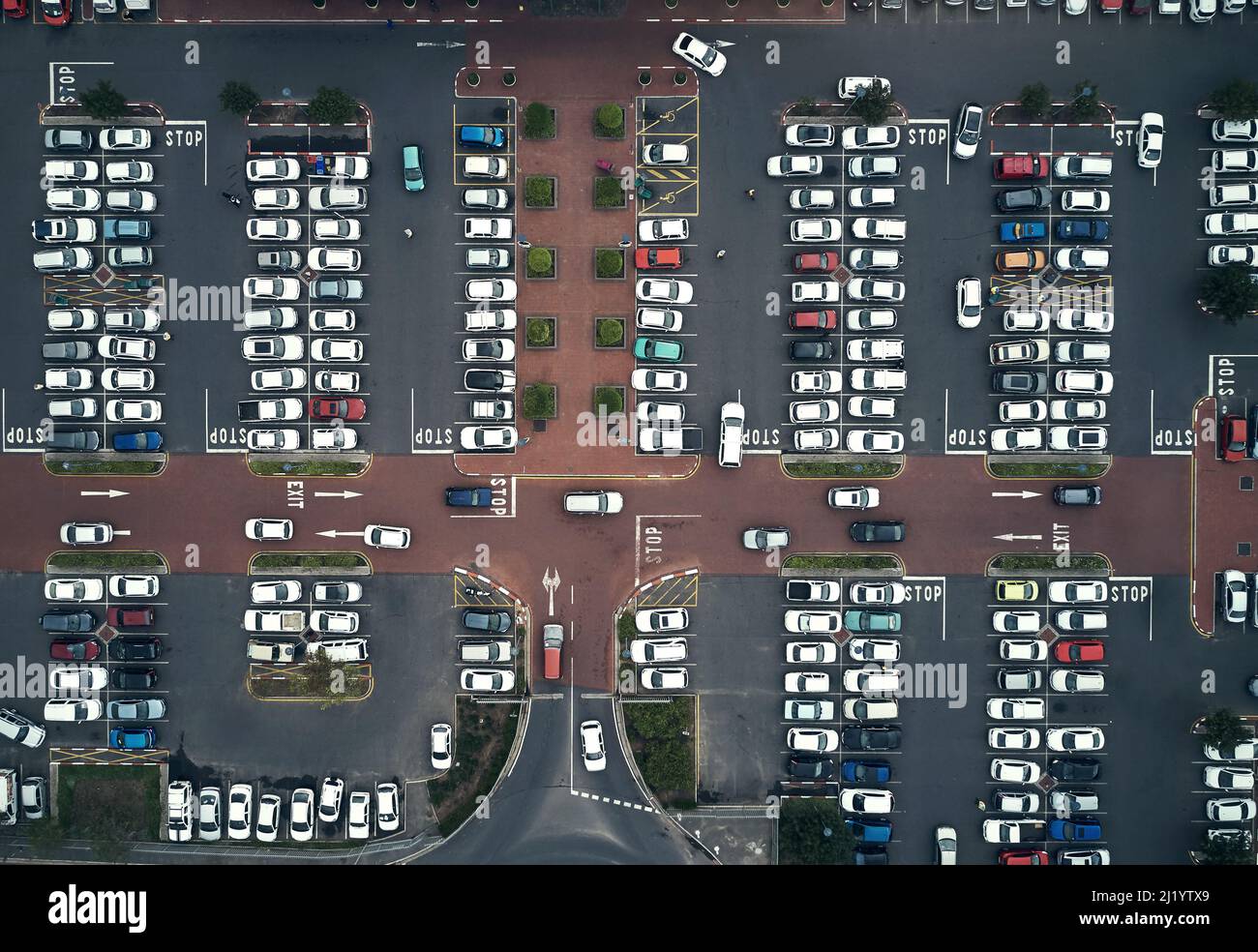 Parking lots are filling up again. High angle shot of a large parking ...