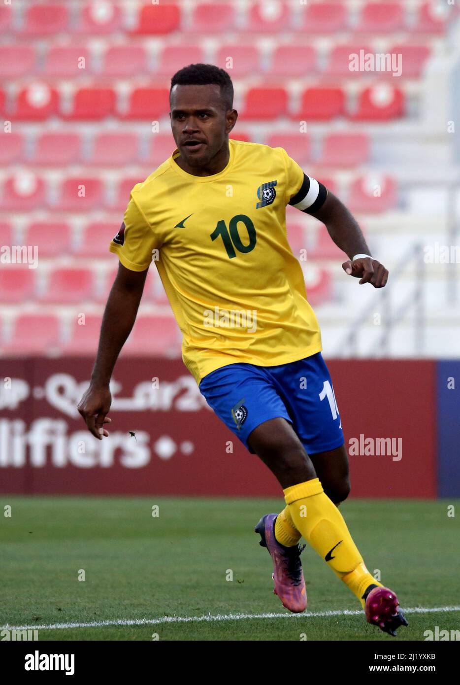 DOHA, QATAR - MARCH 27: Micah Lea'alafa of Solomom Islands in action ...