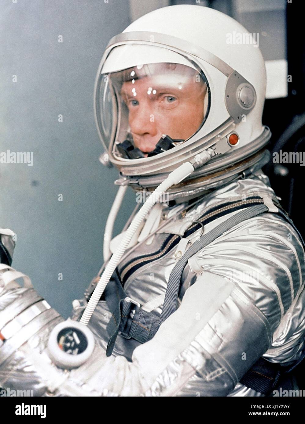 Astronaut John Glenn in his silver Mercury pressure suit in preparation ...