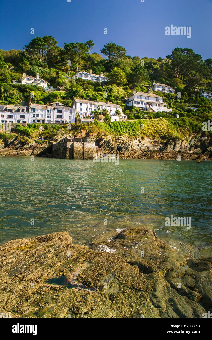 Looking across the bay / harbour in Polperro, Cornwall. Polperro is a ...