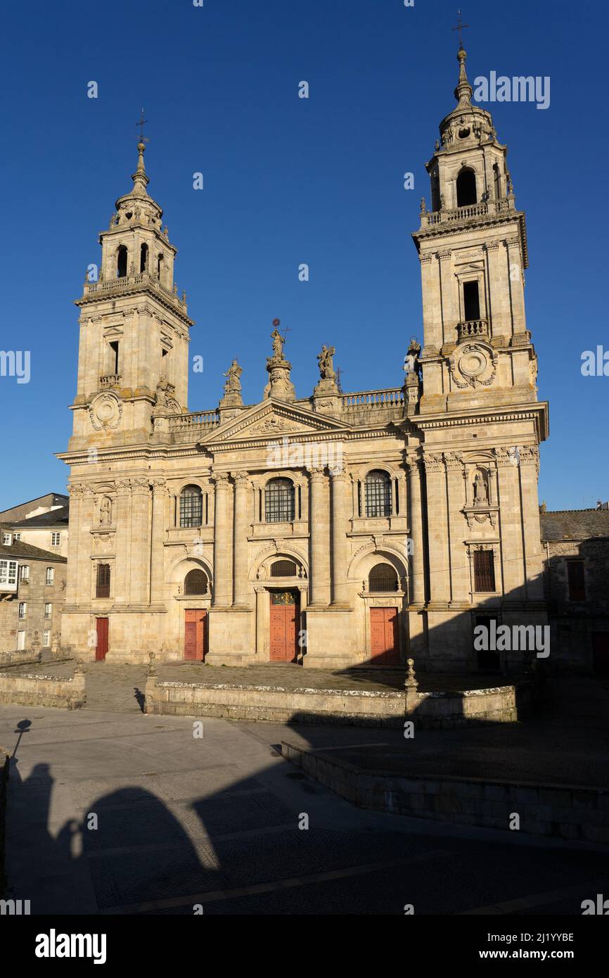 Cathedral of the fortified city of Lugo at sunset in a sunny day ...