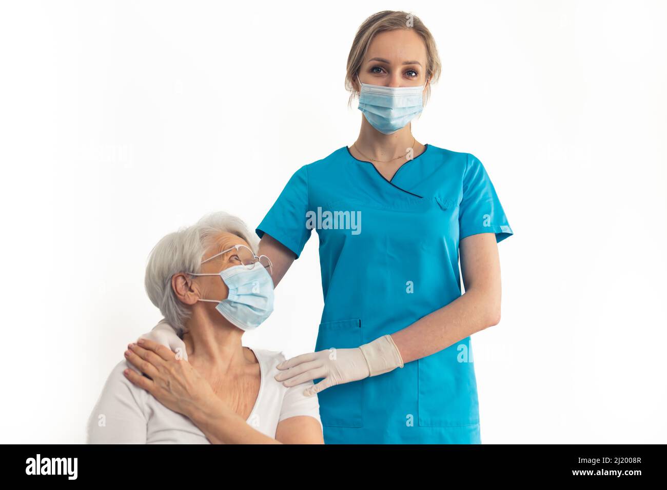 Happy female caregiver and senior woman. Support from healthcare worker ...