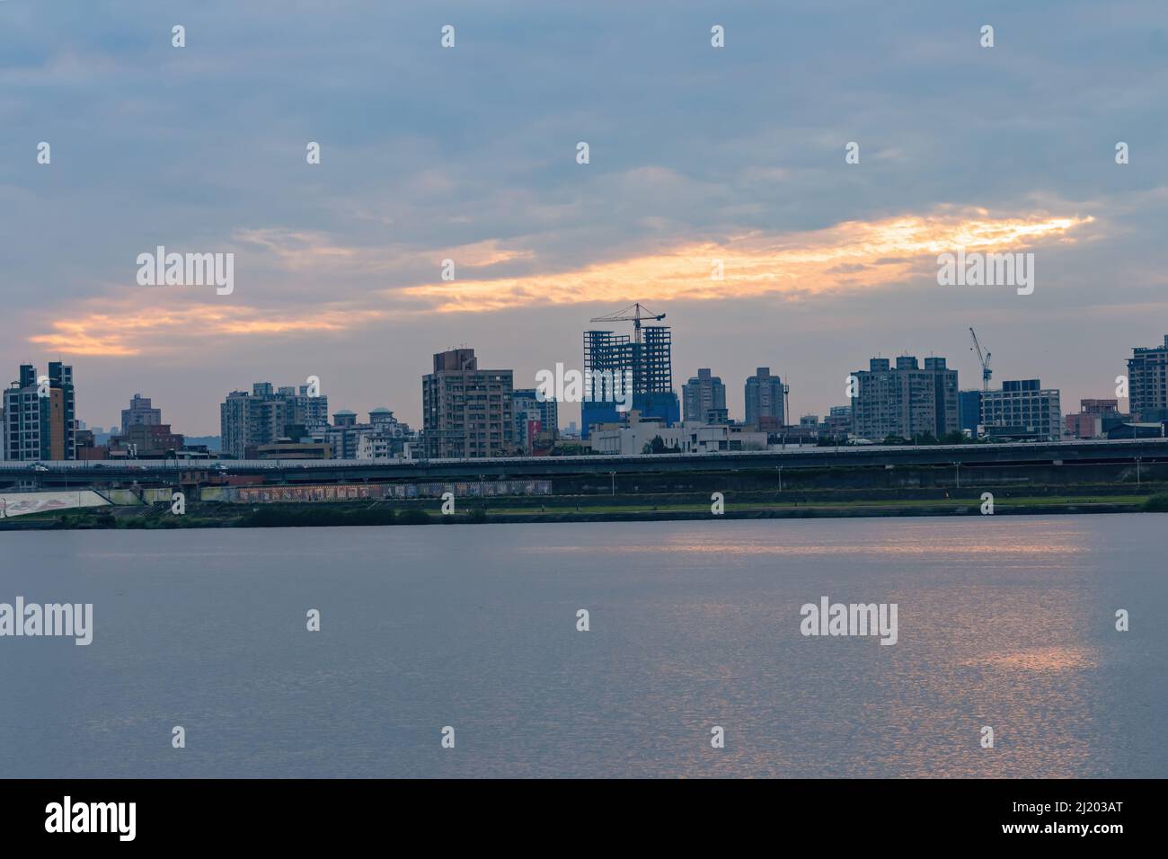Sunset river landscape along the Dadaocheng area at Taipei, Taiwan ...