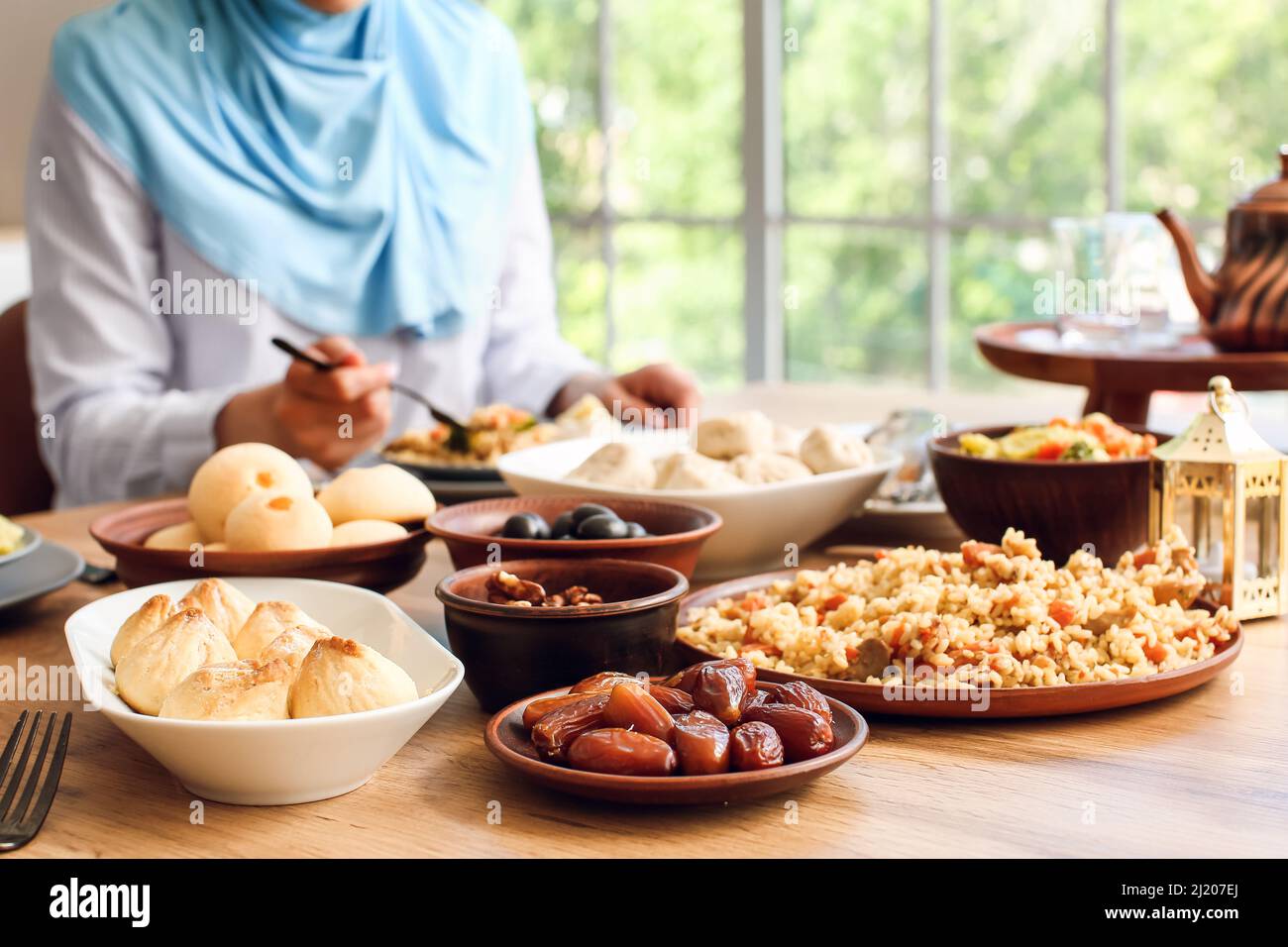Traditional Eastern dishes on table. Celebration of Eid al-Fitr Stock ...