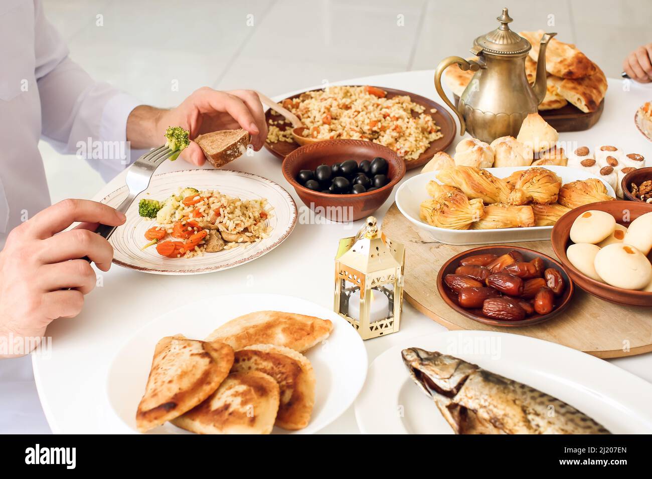 Traditional Eastern dishes on table. Celebration of Eid al-Fitr Stock ...