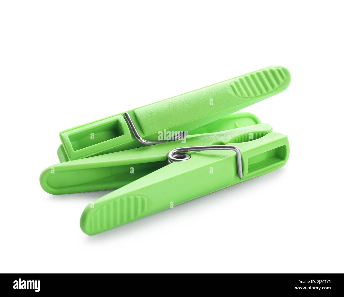 Plastic clothes pins on white background Stock Photo - Alamy