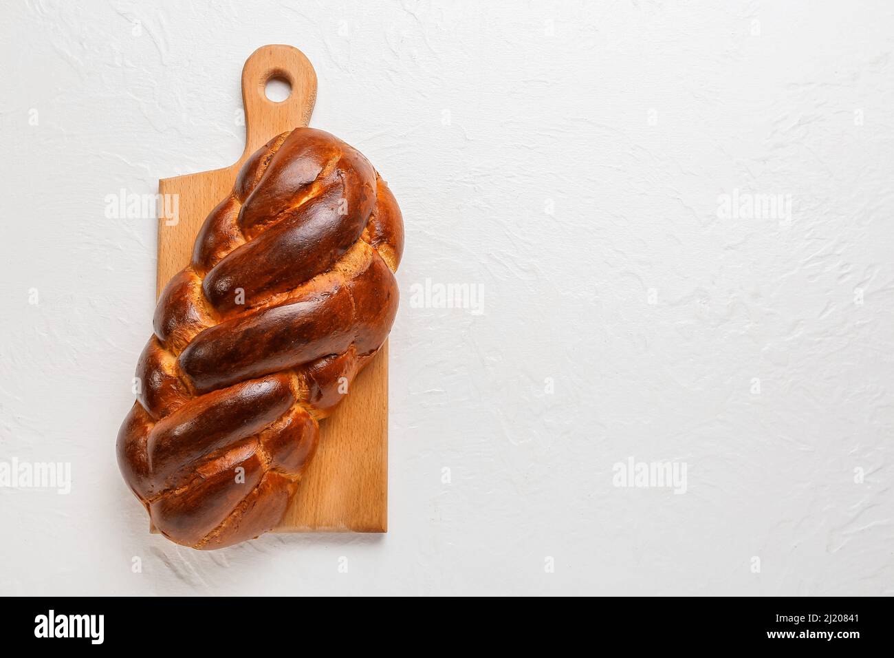 Traditional challah bread on white background. Shabbat Shalom Stock ...