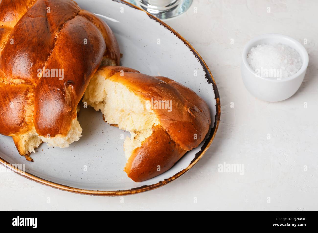 Traditional challah bread on white background. Shabbat Shalom Stock ...