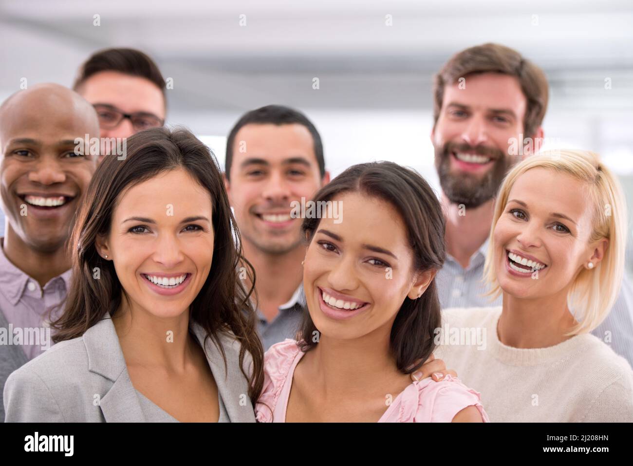 Success would put a smile on your face too. Cropped shot of a group of ...