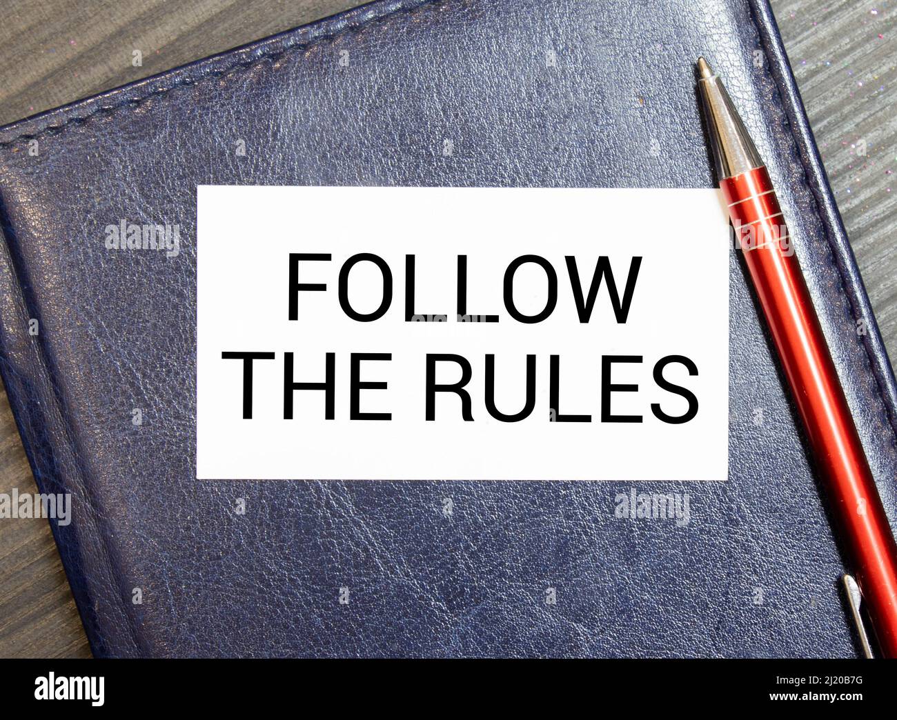 Follow The Rules text written on a notebook with pencils Stock Photo ...