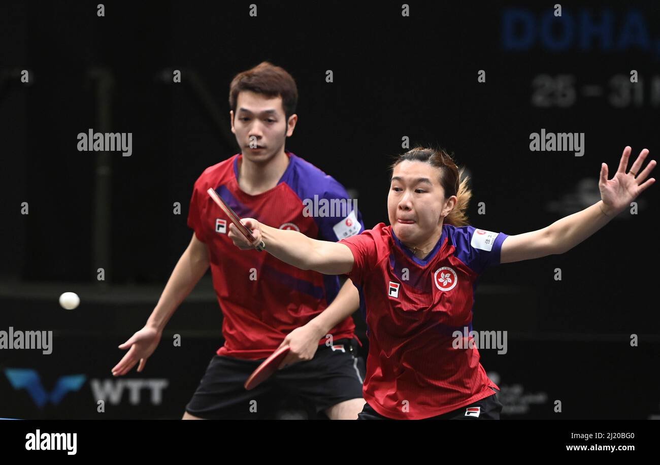Doha, Qatar. 28th Mar, 2022. Ho Kwan-Kit/Lee Ho-Ching (R) of China's ...