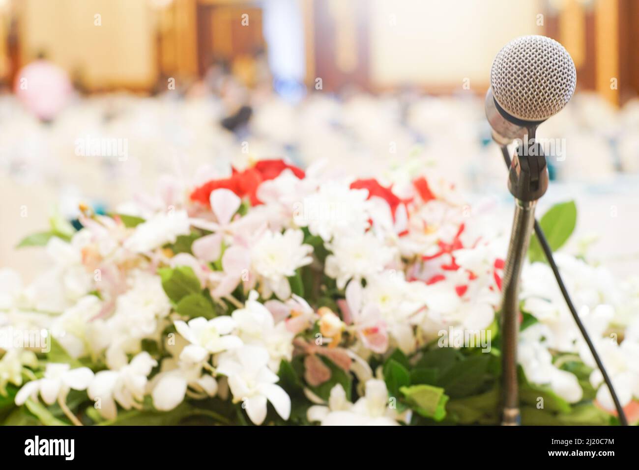 Microphone close up in meeting seminar room blurred background with ...